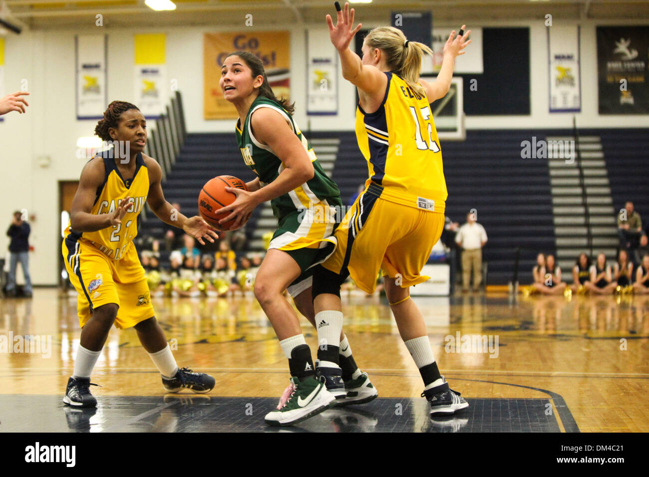 Siena's Cristina Centeno (25) goes for the basket at Canisius's Ashley ...