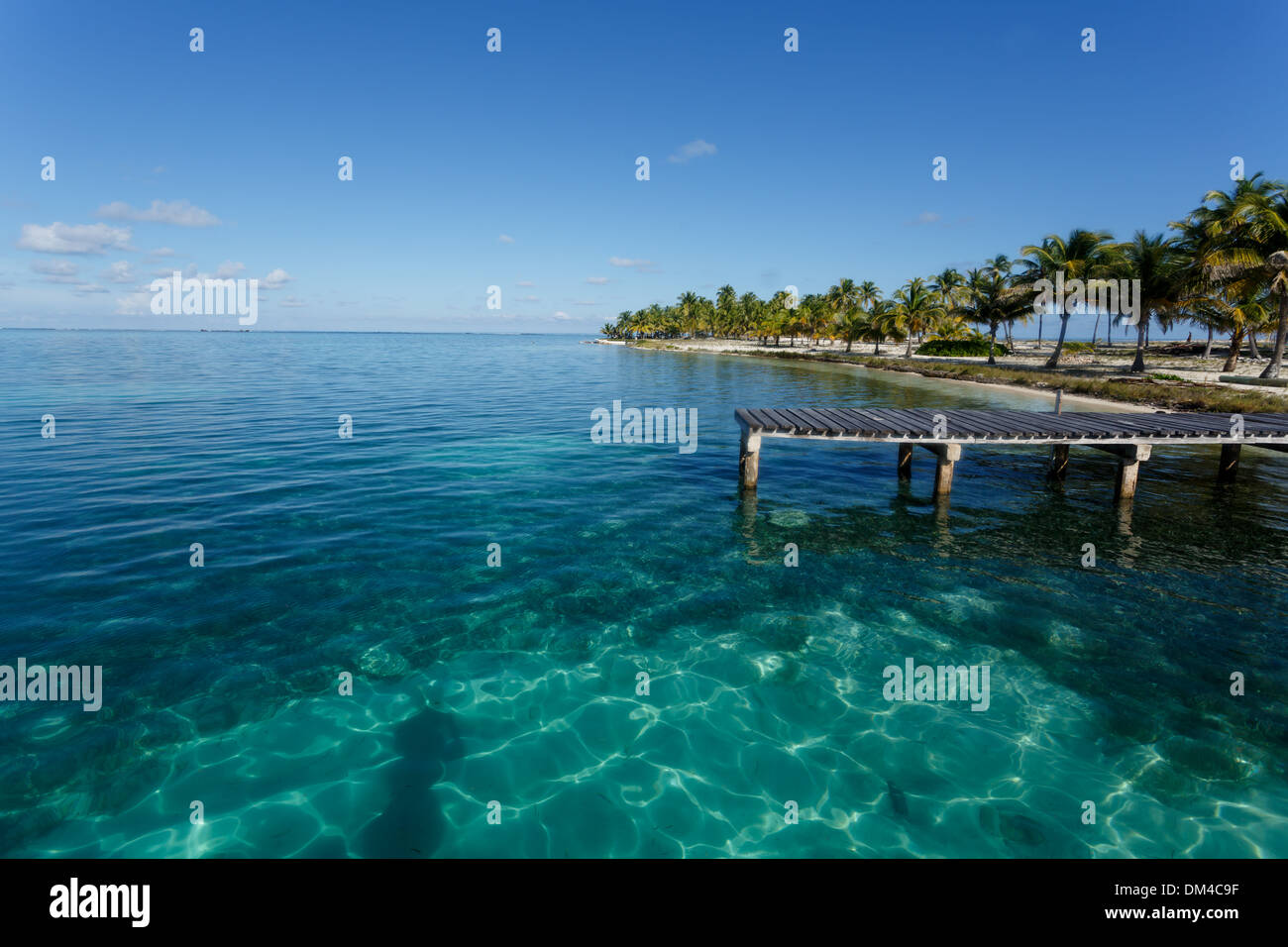 Dock With Clear Blue Tropical Water High Resolution Stock Photography ...