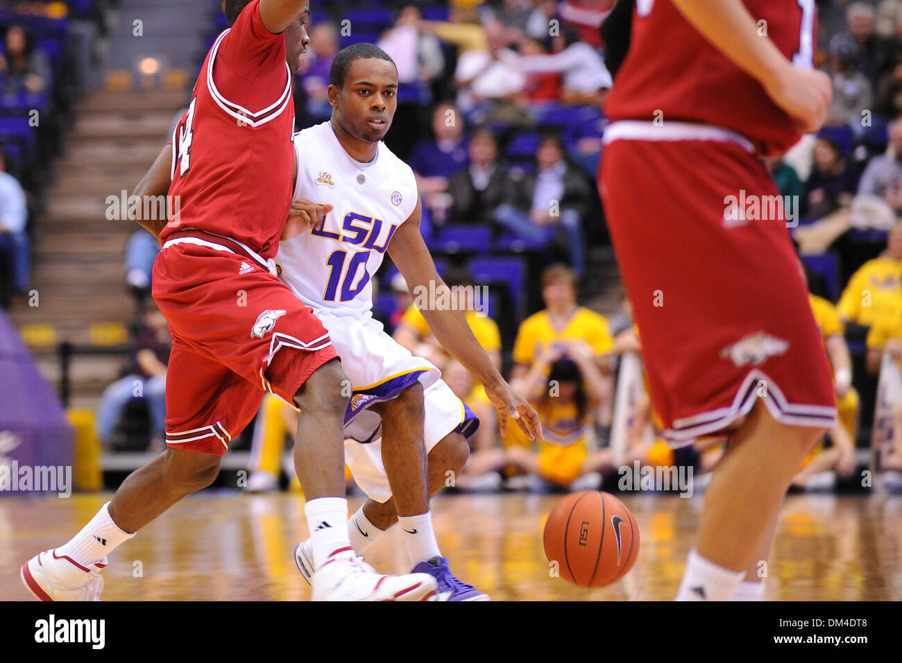 LSU guard, #10 Daron Poplulist, looks for an open man during an SEC ...