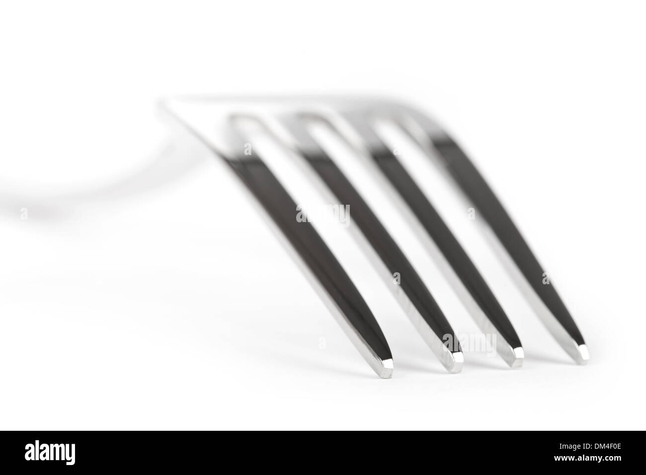 Fork closeup on white Stock Photo - Alamy