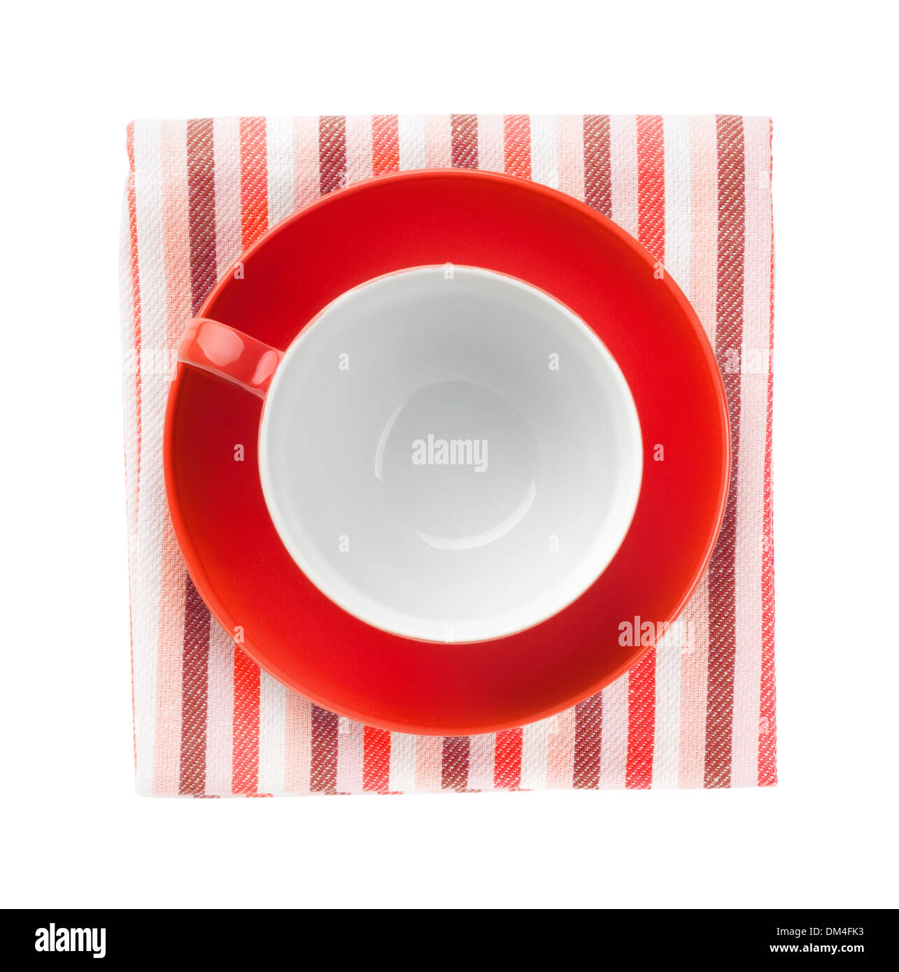 Red coffee cup over kitchen towel. View from above. Isolated on white ...