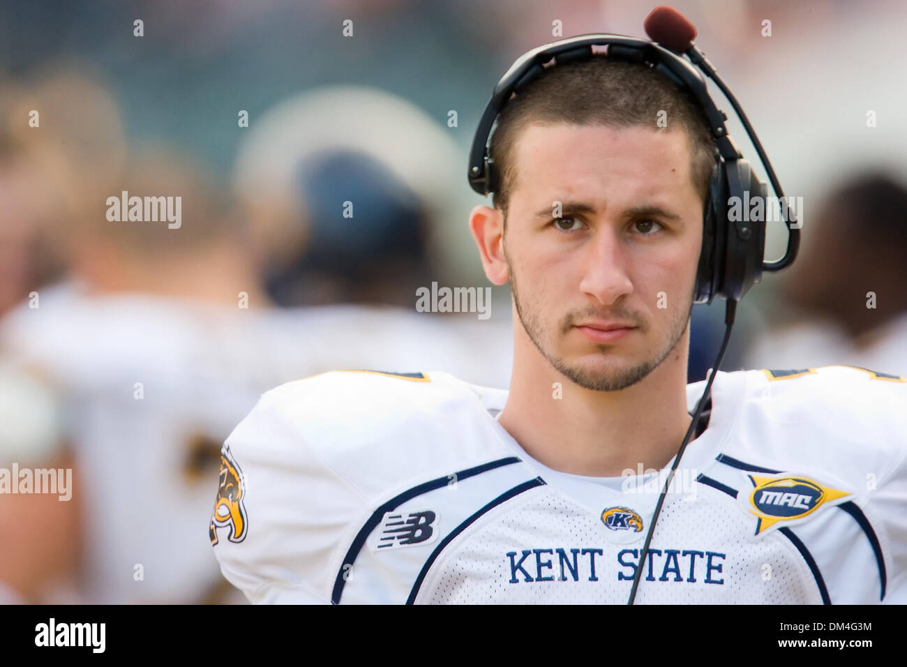 Kent State Golden Flash quarterback Anthony Magazu (7) with the headset ...