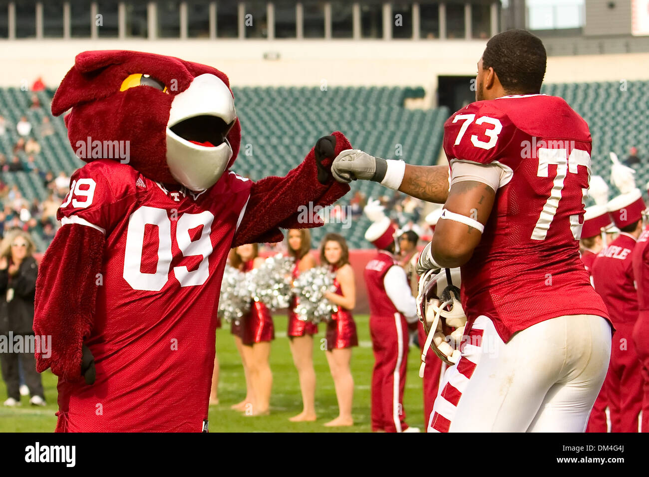 Temple Owls mascot, Hooter, gets a fist bump from Temple Owls offensive ...