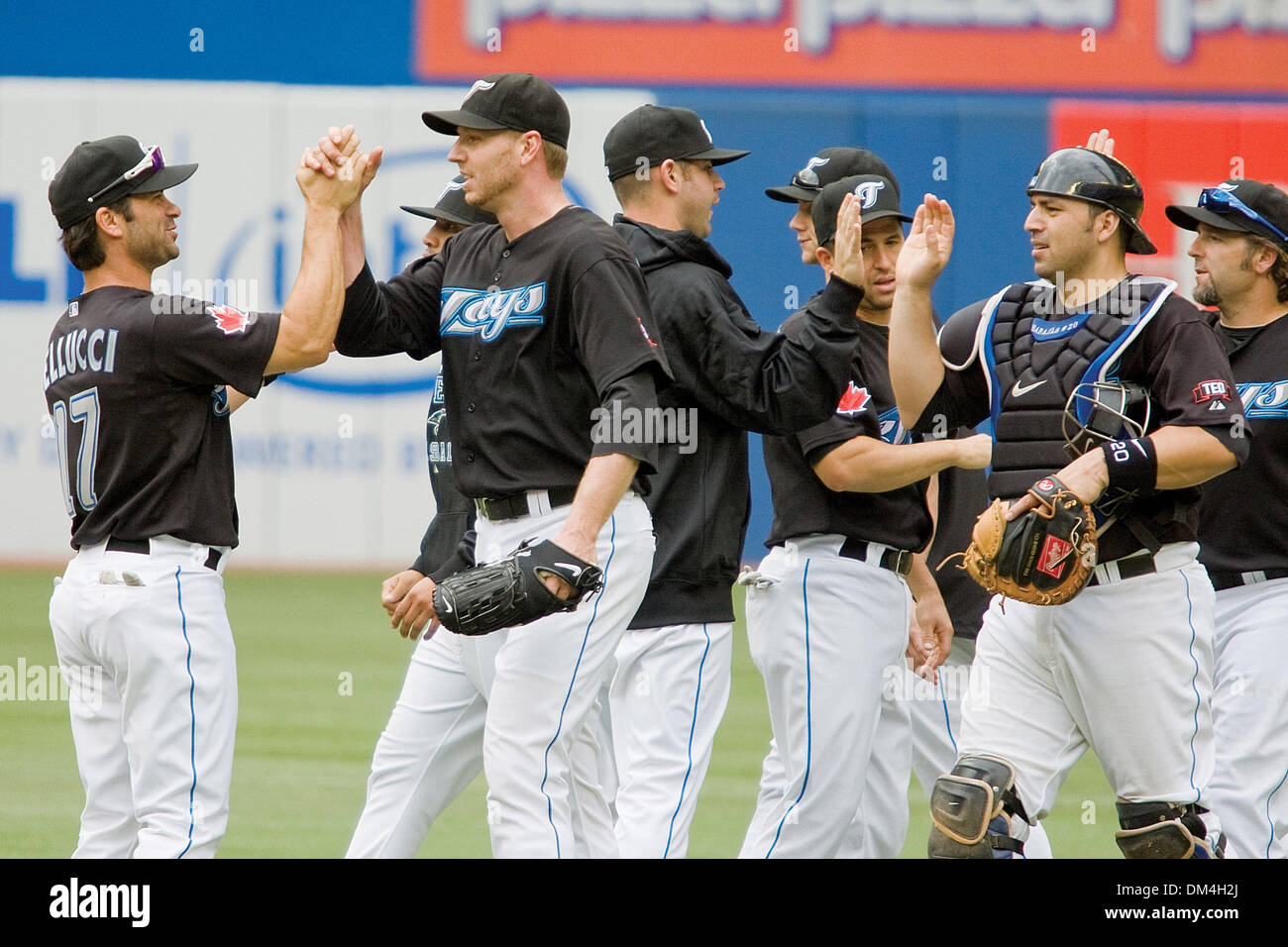 Roy ''Doc'' Halladay and the Toronto Bue Jays celebrate their 3-1 ...