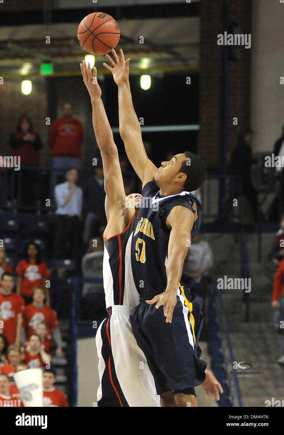 Gonzaga's Robert Sacre, left, fights for the opening tip with Augustana ...