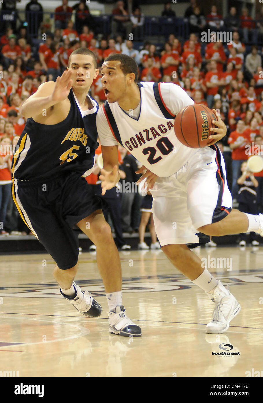 Gonzaga's Elias Harris tries to drive the lane past Augustana's Kameron ...