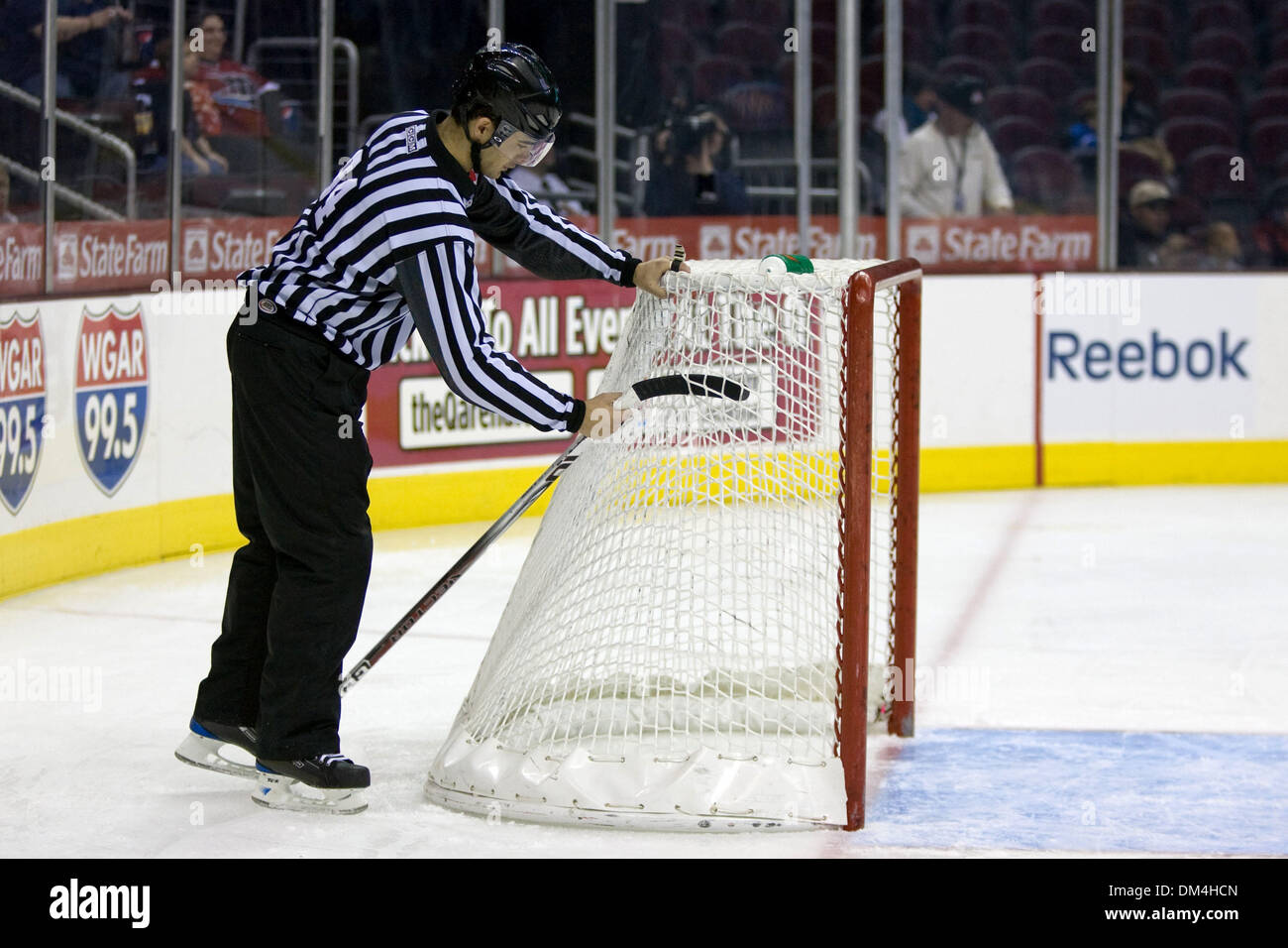 13 December 2009: Linesmen Fraser McIntyre (94) removes a stick from ...