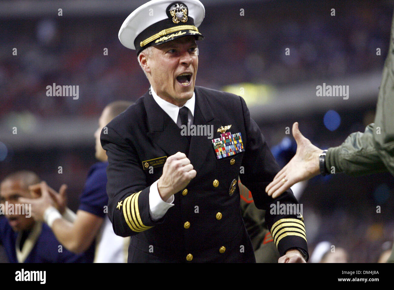 Captain Matthew L. Klunder, Commandant of Navy Midshipmen celebrates a ...