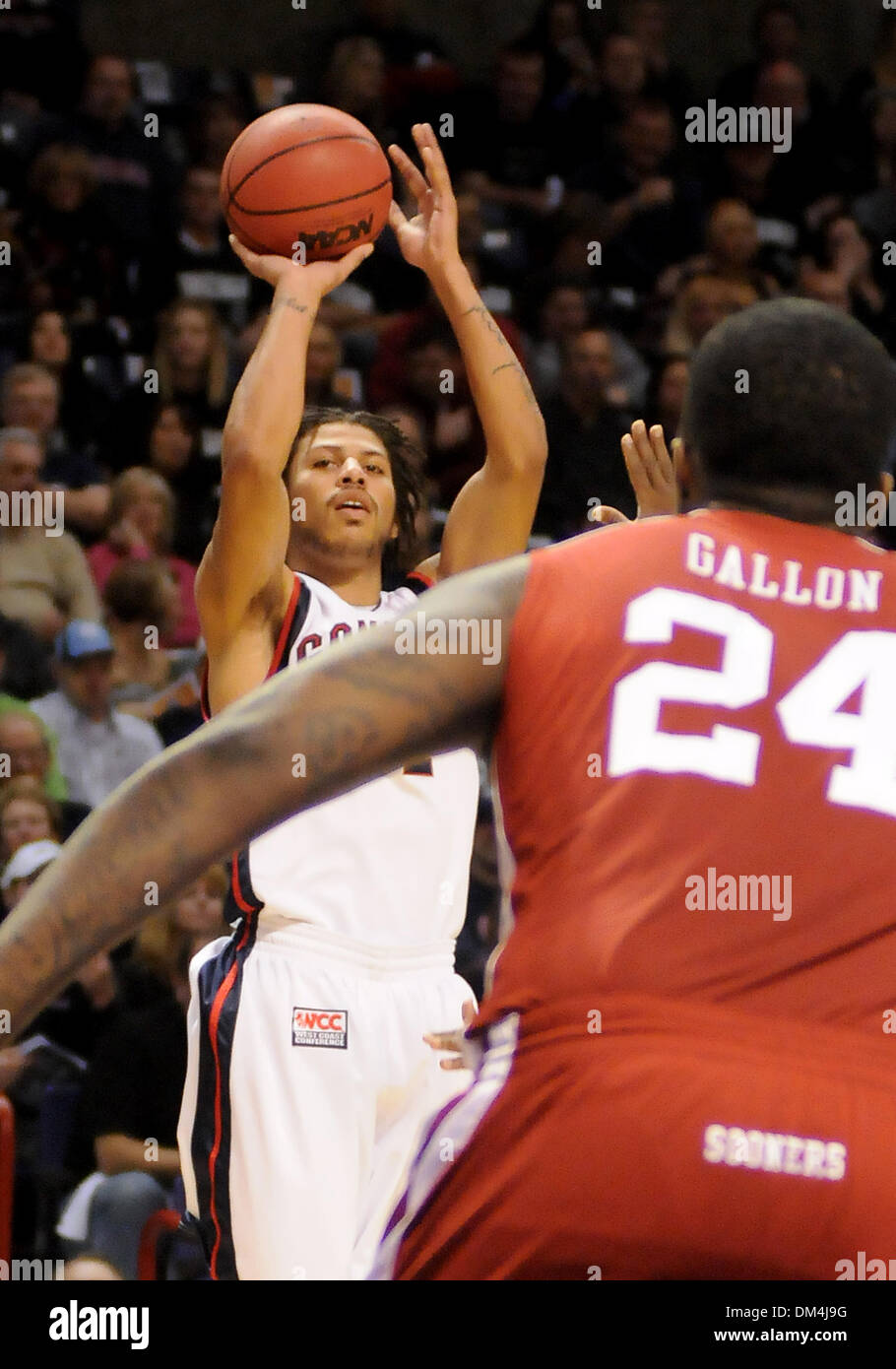 Gonzaga's Steven Gray drains a three pointer over the Oklahoma defense ...