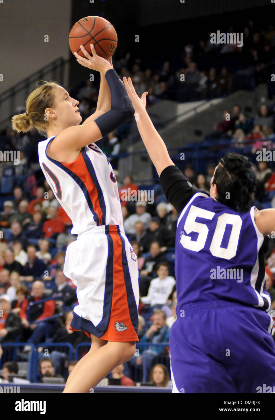 Gonzaga's Heather Bowman, left, puts up a shot over Portland's Lauren ...