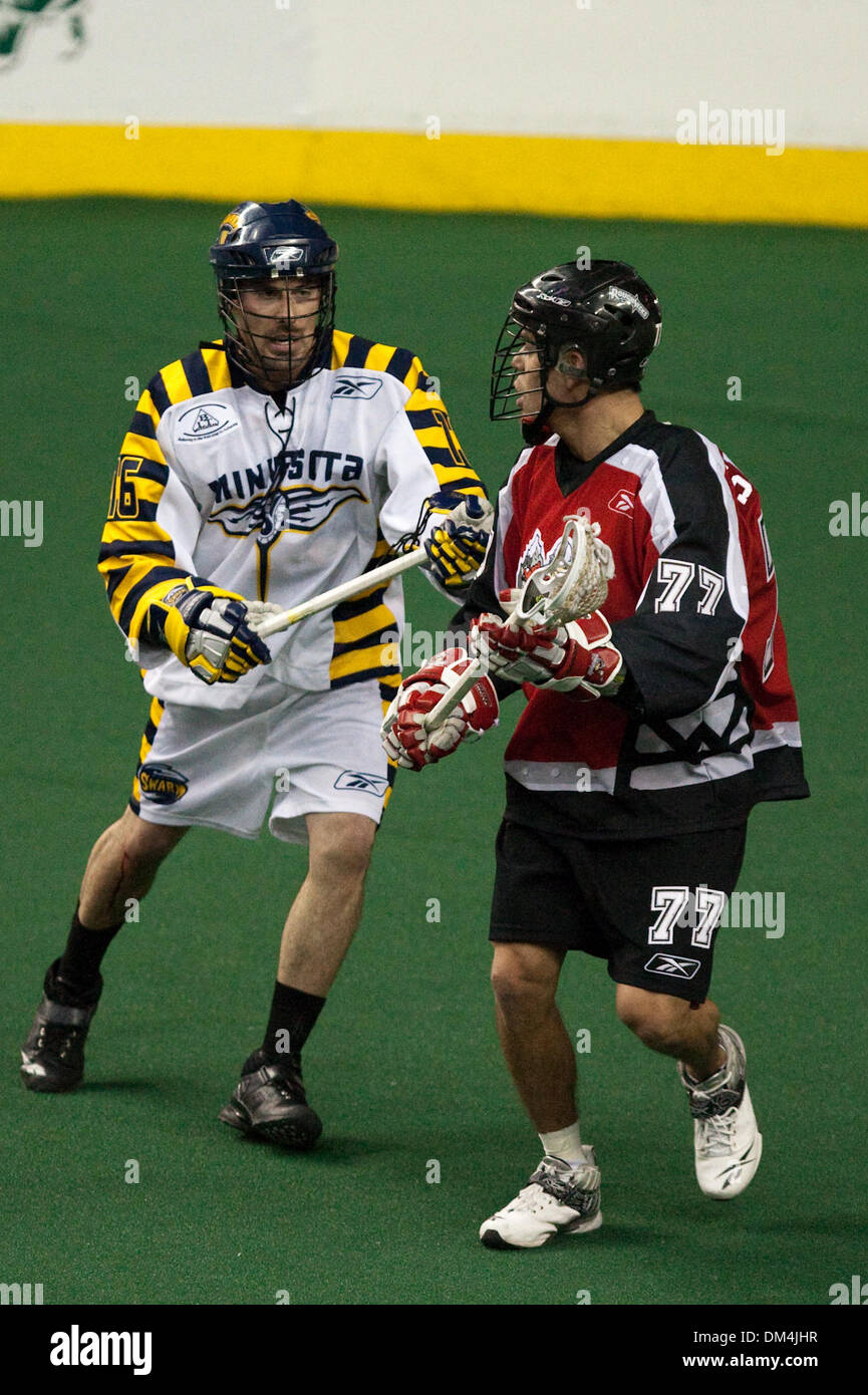 Calgary Roughnecks forward Jeff Shattler (77) and Minnesota Swarm ...