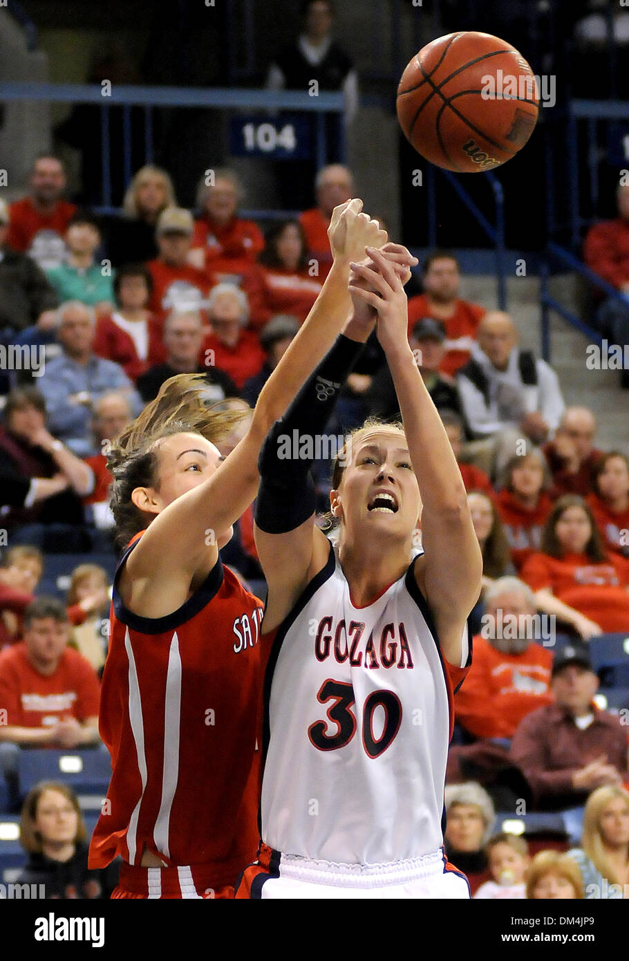 Gonzaga's Heather Bowman (30) is fouled during a rebound by Saint Mary ...