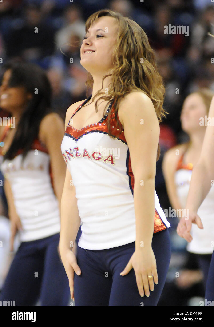 A member of the Gonzaga dance team performs during a NCAA college ...