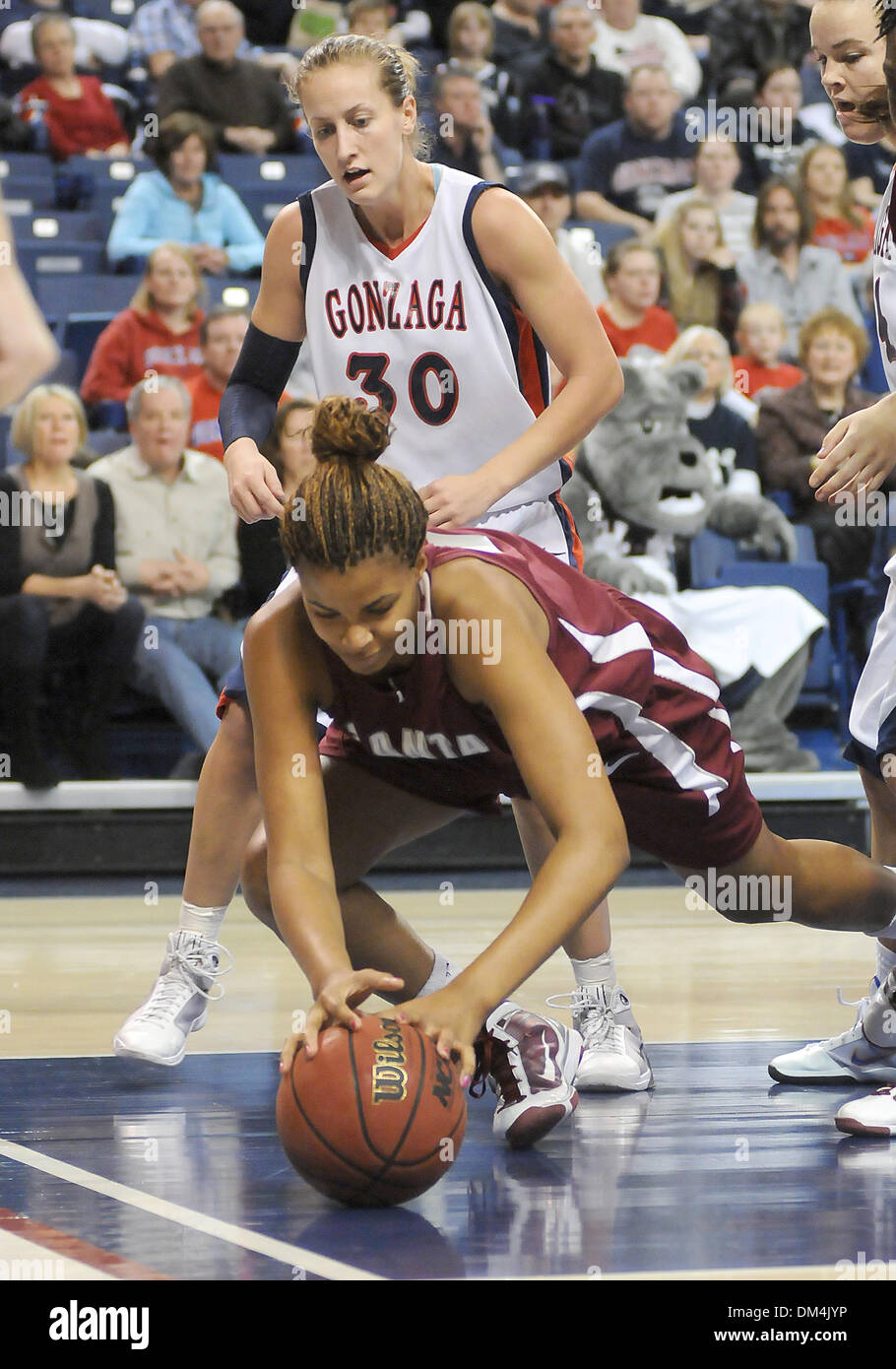 Santa Clara's forward Becca Thomas tries to save the ball from going ...