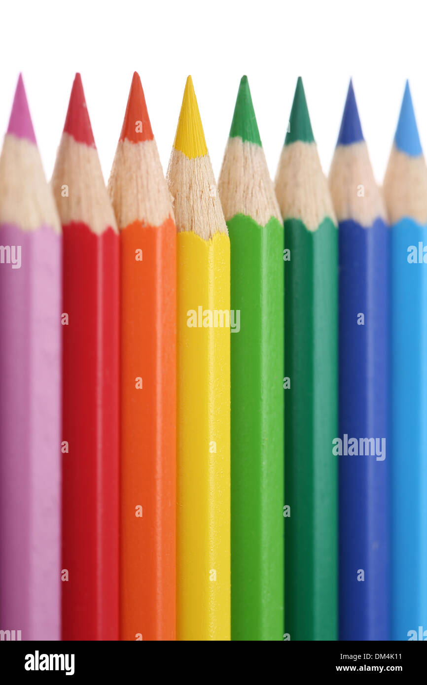 Colored pencils in a row, isolated on a white background Stock Photo ...