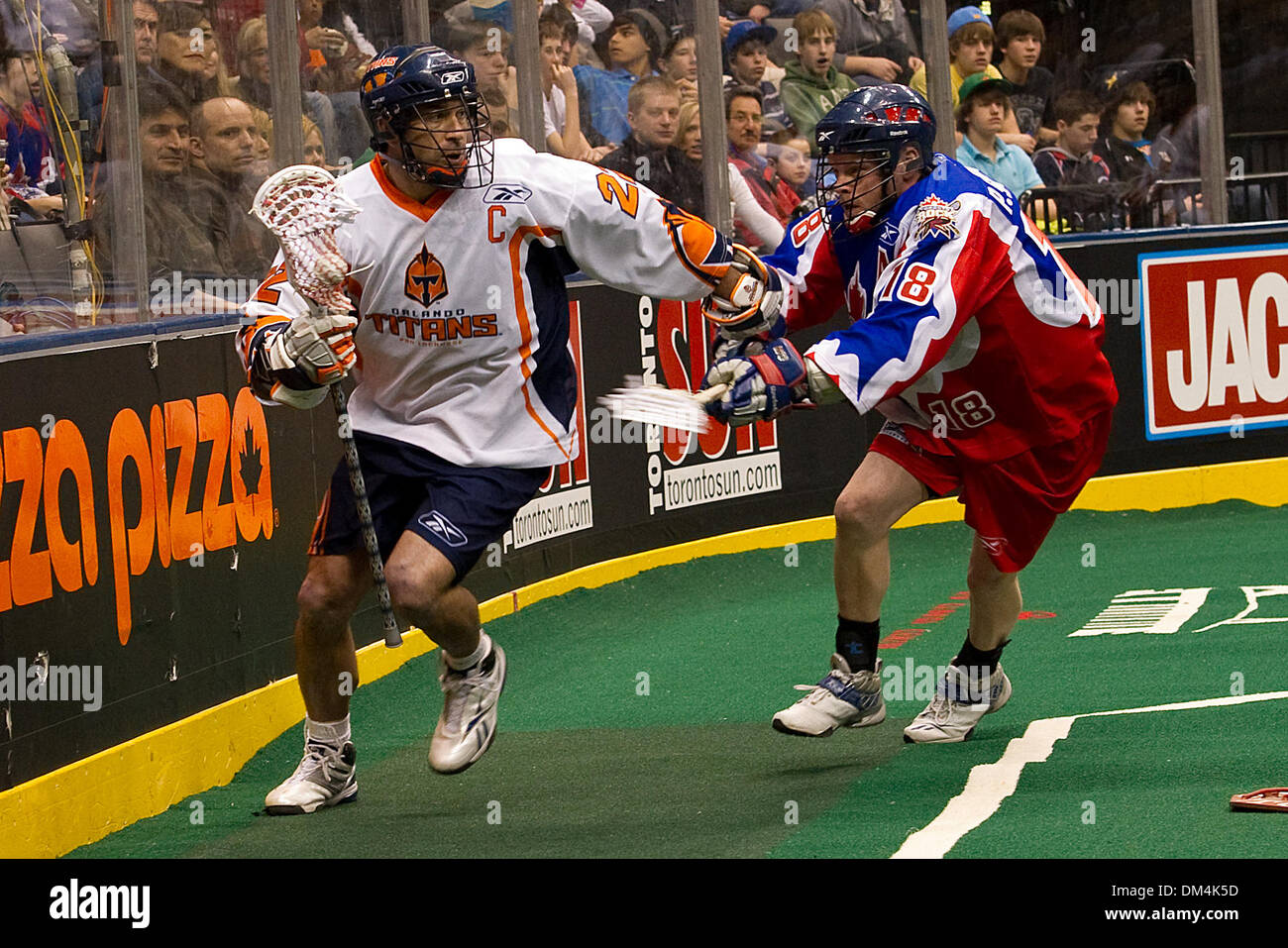 Toronto Rock defensemen Phil Sanderson #18 and Orlando Titans forward ...