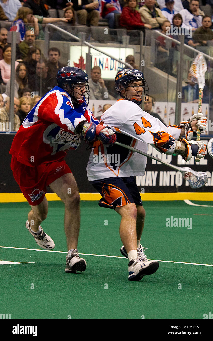 Toronto Rock defensemen Jeff Gilbert #4 and Orlando Titans forward ...