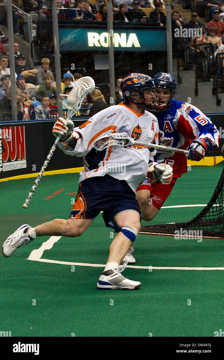 Orlando Titans forward Ryan Boyle #14 and Toronto Rock defensemen Sandy ...