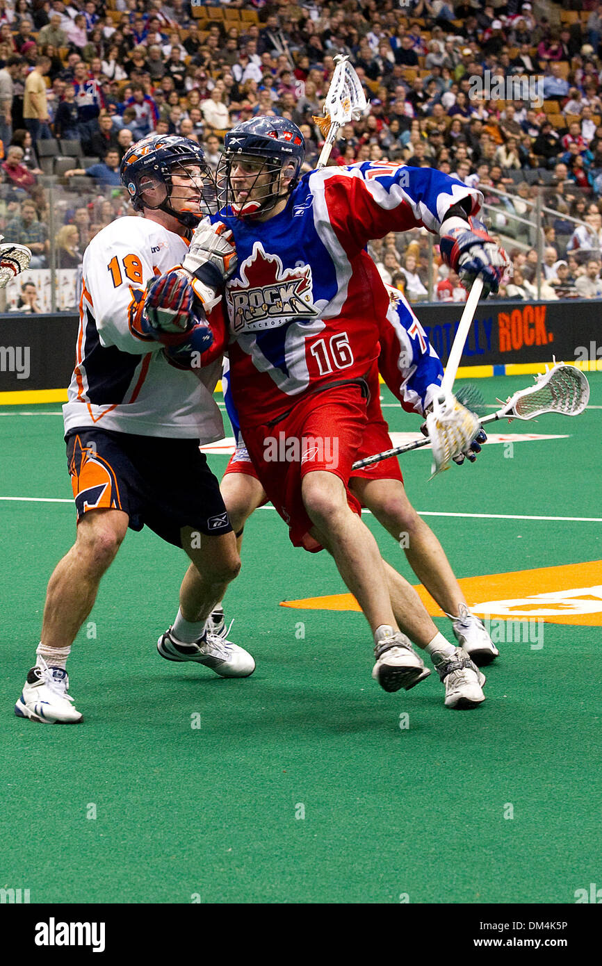 Orlando Titans defensemen Stephen Peyser #18 and Toronto Rock forward ...