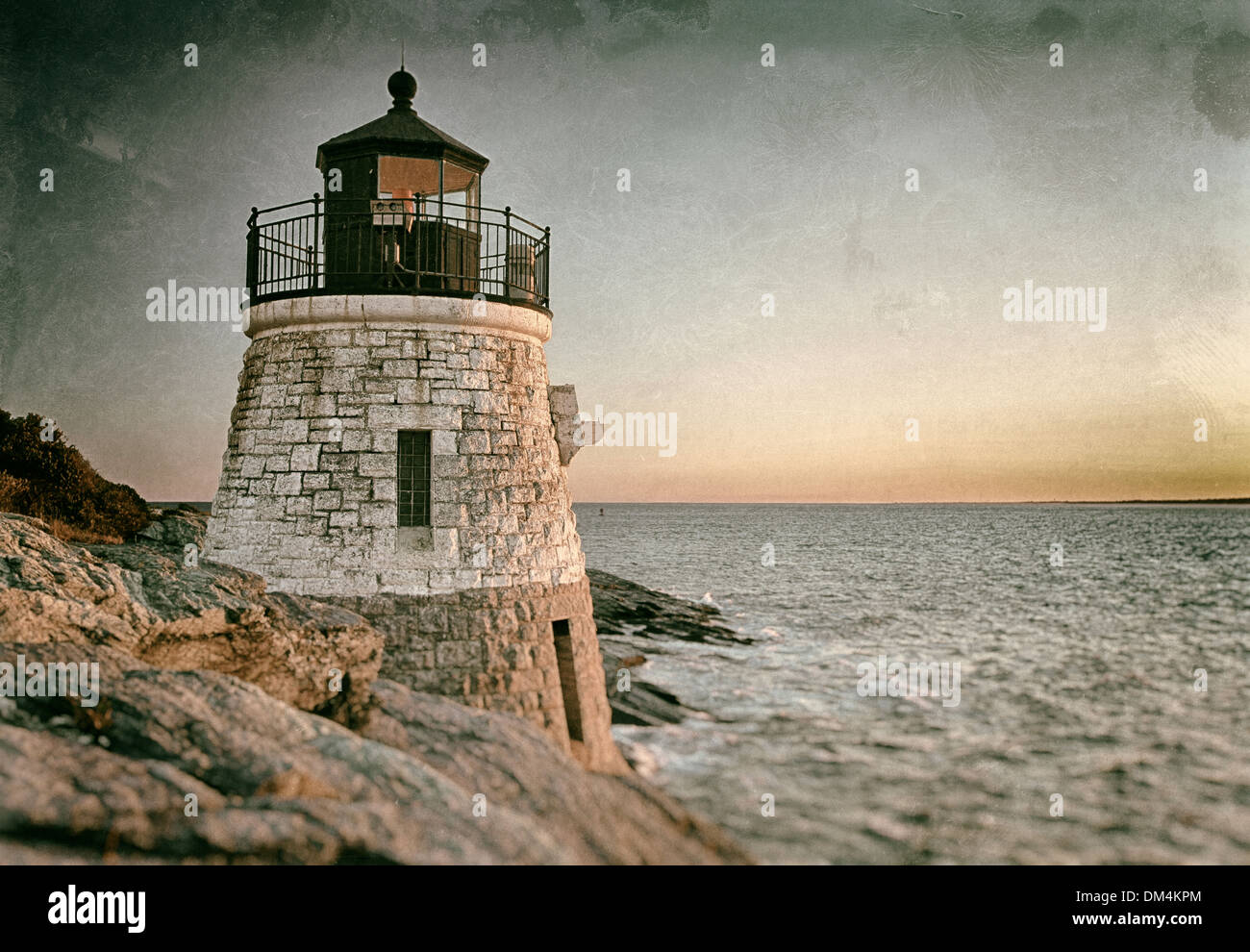 Beautiful old lighthouse on rocks at sunset vintage look Stock Photo ...