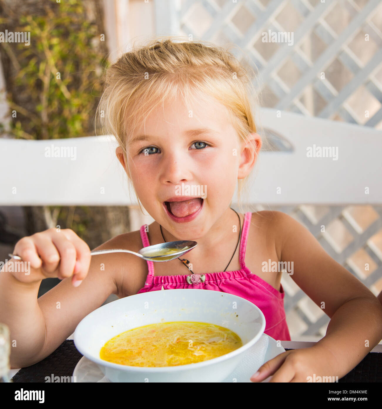 Cute child eating soup from the bowl, healthy food Stock Photo - Alamy