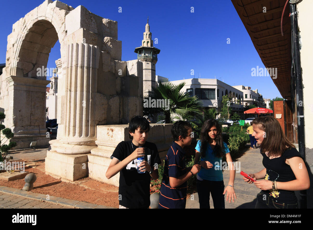 Syriac Christian teens in the Via Recta st. of Damascus, Syria Stock ...