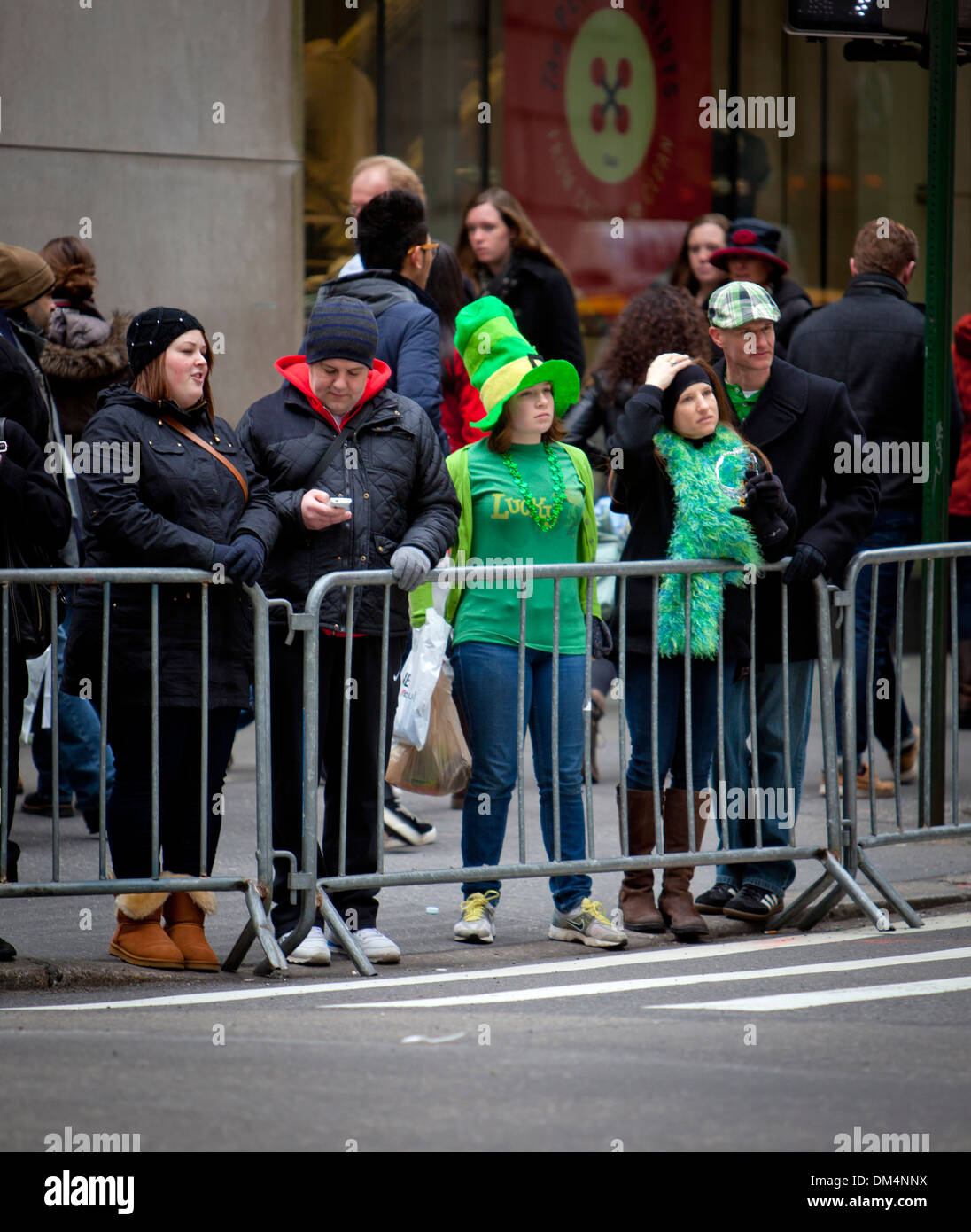 NEW YORK, NY, USA - MAR 16: Spectators at the St. Patrick's Day Parade ...