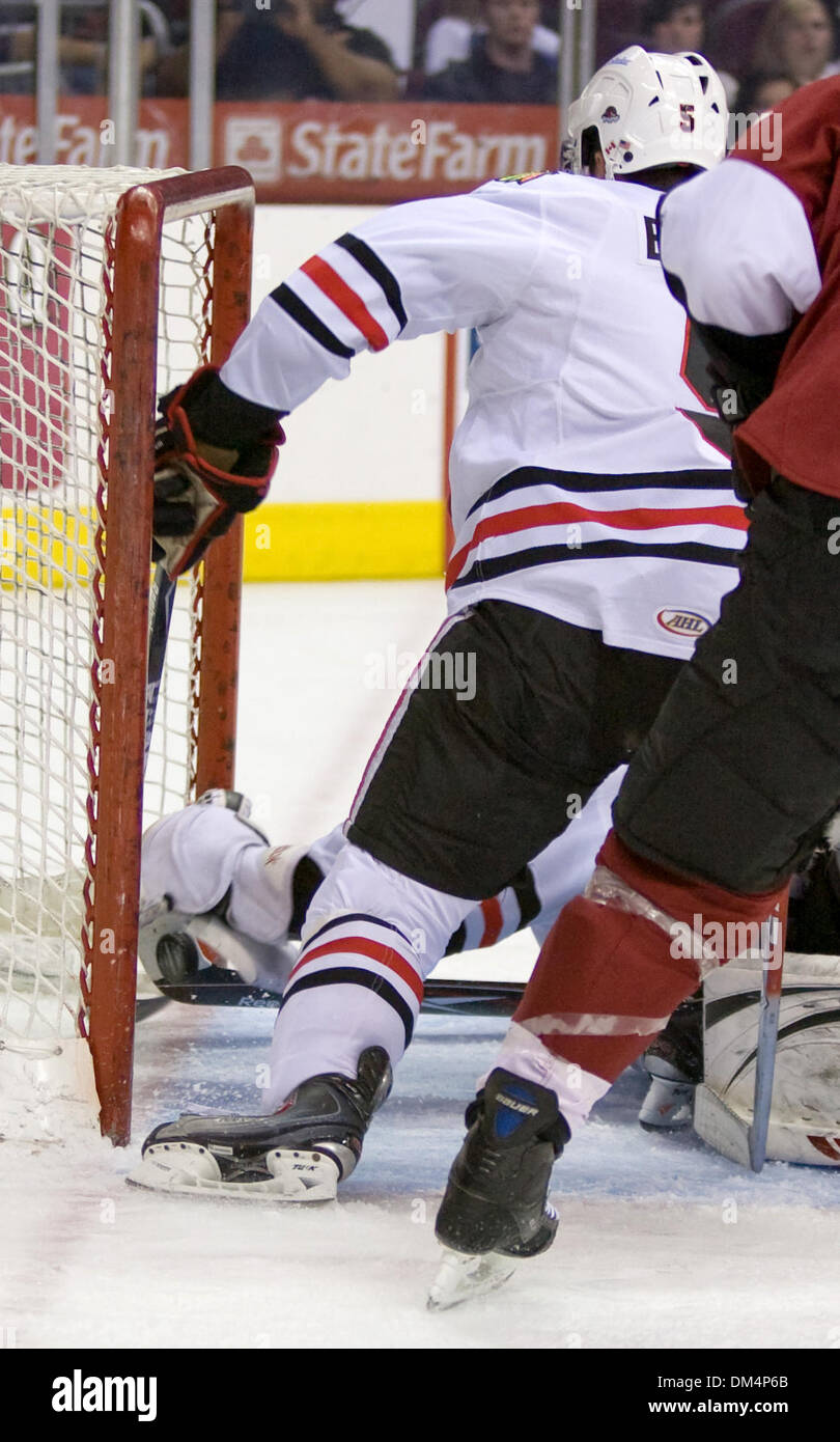 05 February 2010: Rockford IceHogs Corey Crawford (29) and Mike Brennan ...