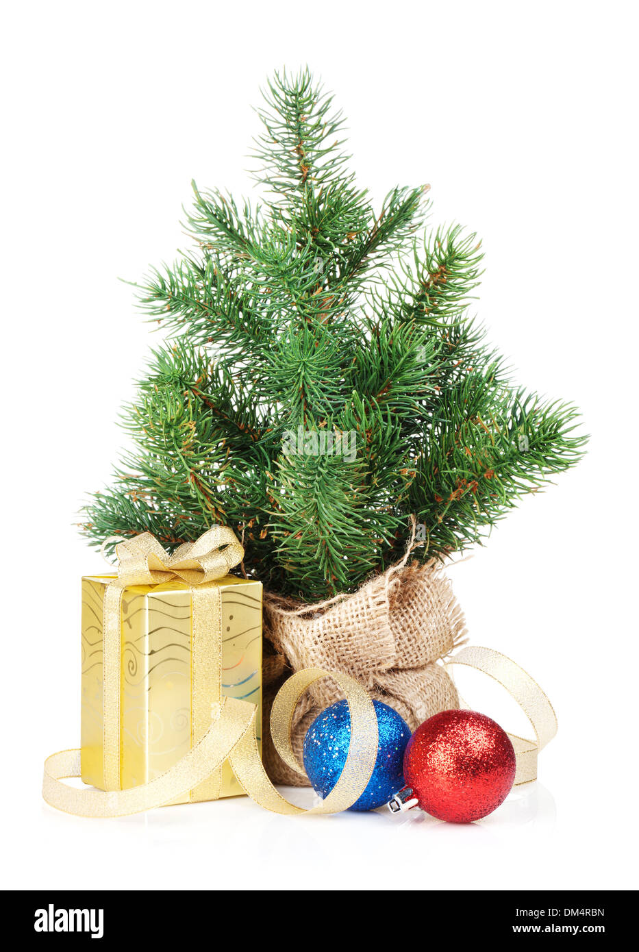 Small christmas tree with decor and gift box. Isolated on white ...
