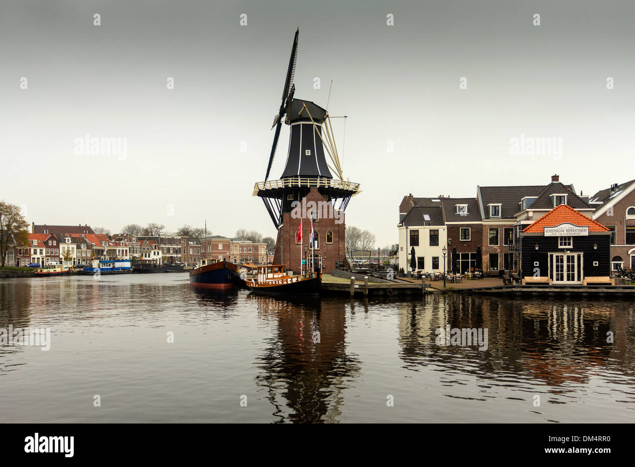 MOLEN DE ADRIAAN WINDMILL AND SPAARNE RIVER IN CENTRAL HAARLEM HOLLAND ...