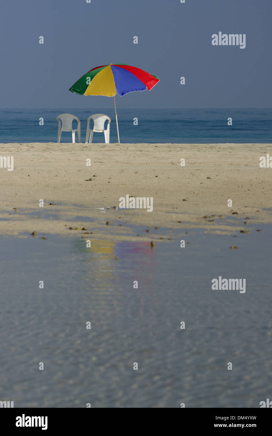 Beach umbrella and chairs, Jarada Island, Kingdom of Bahrain Stock ...