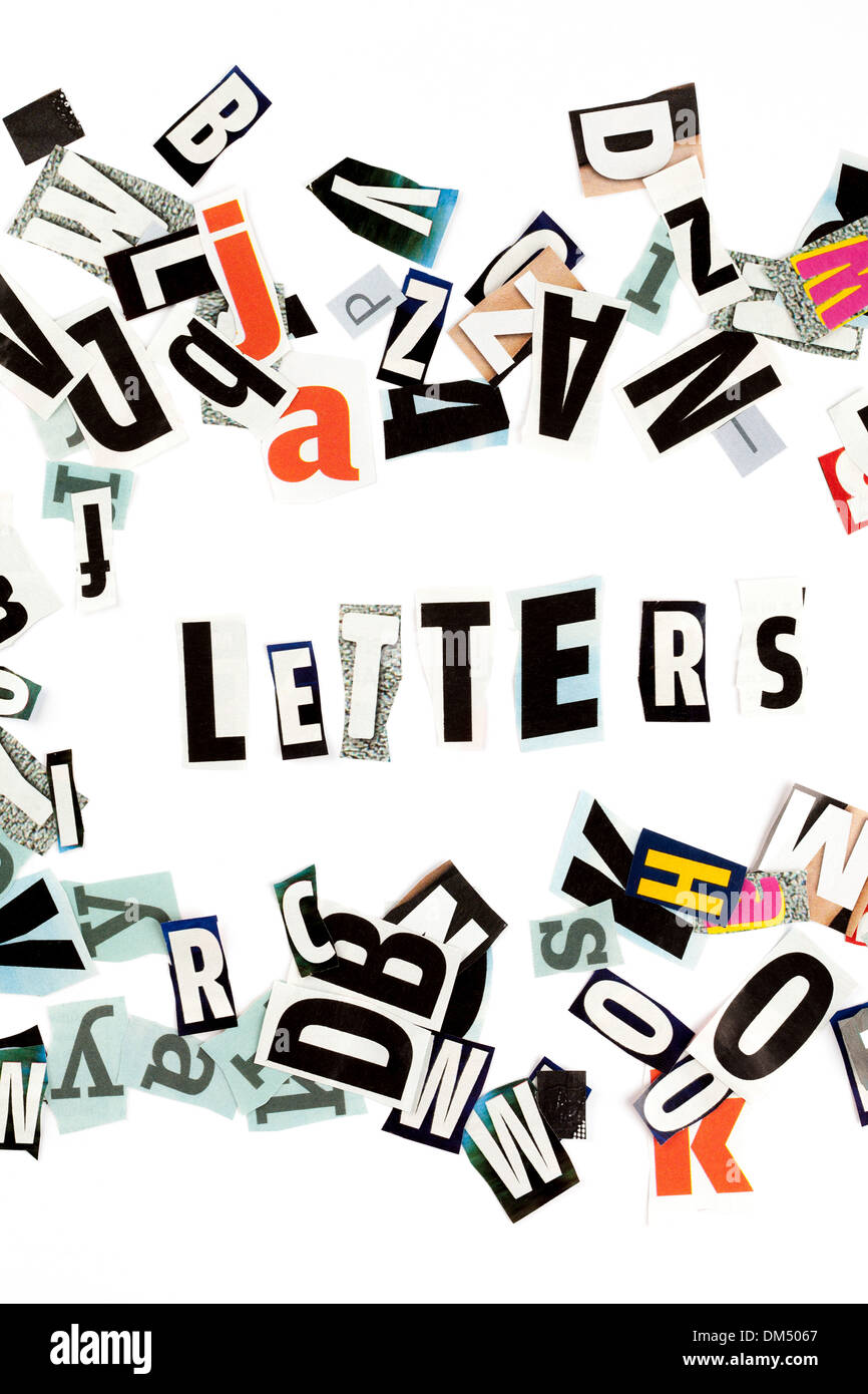 Letters inscription made with cut out letters Stock Photo - Alamy