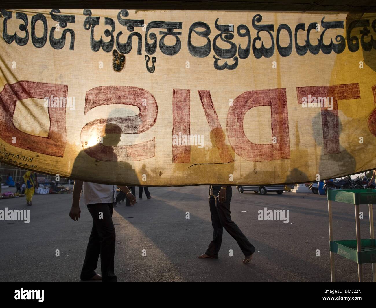 Mysore, Karnataka, India. 3rd Jan, 2013. Group of people walking next ...