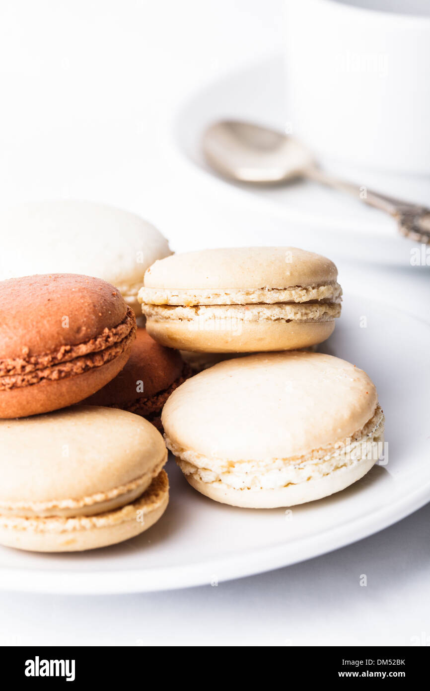 Three macaroons chocolate vanilla hi-res stock photography and images ...