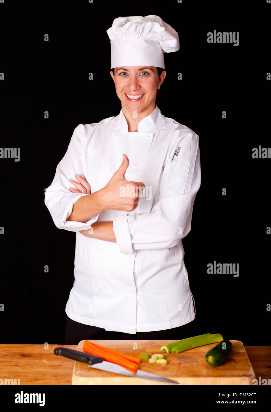 Female chef isolated on black background Stock Photo - Alamy