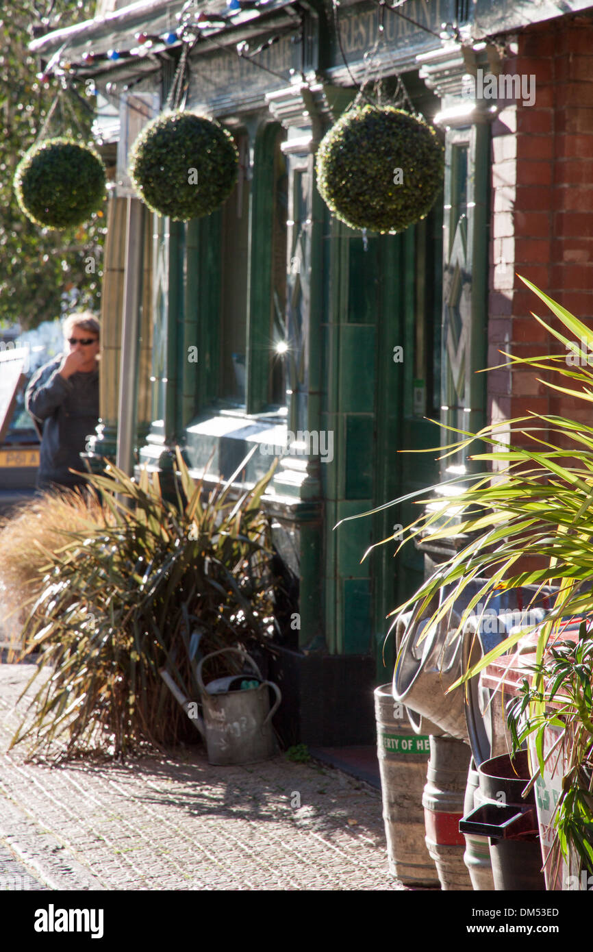 Smoking outside a pub, The Dolphin Pub, Dartmouth Devon, UK Stock Photo ...