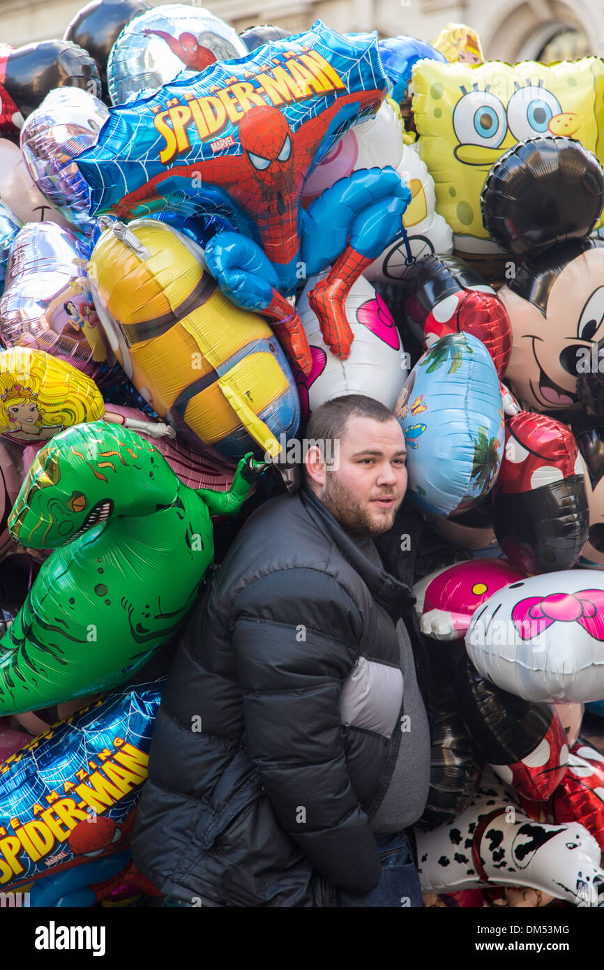 Street sellers selling cartoon character balloons , Birmingham, UK ...