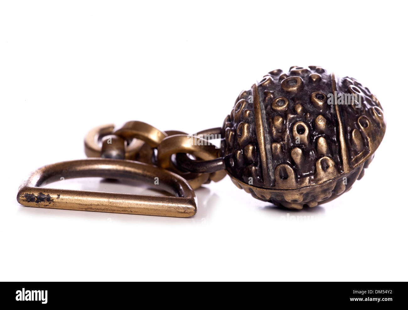 vintage childs brass rattle studio cutout Stock Photo - Alamy