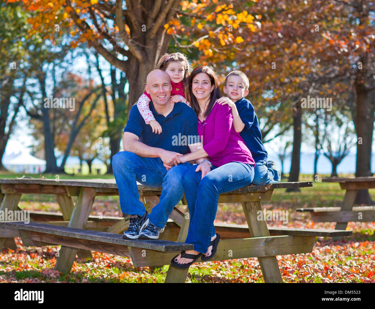 Father daughter sitting bench park autumn hi-res stock photography and ...