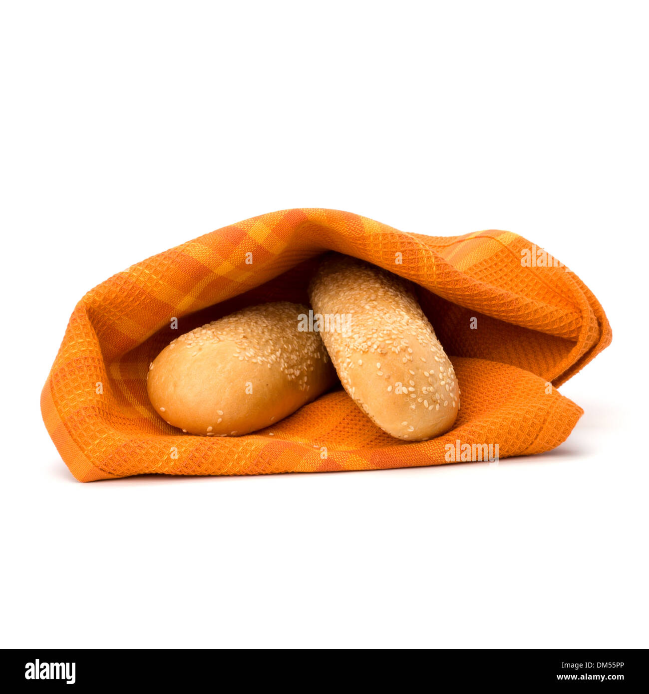 Fresh warm bread over kitchen towel isolated on white background Stock ...