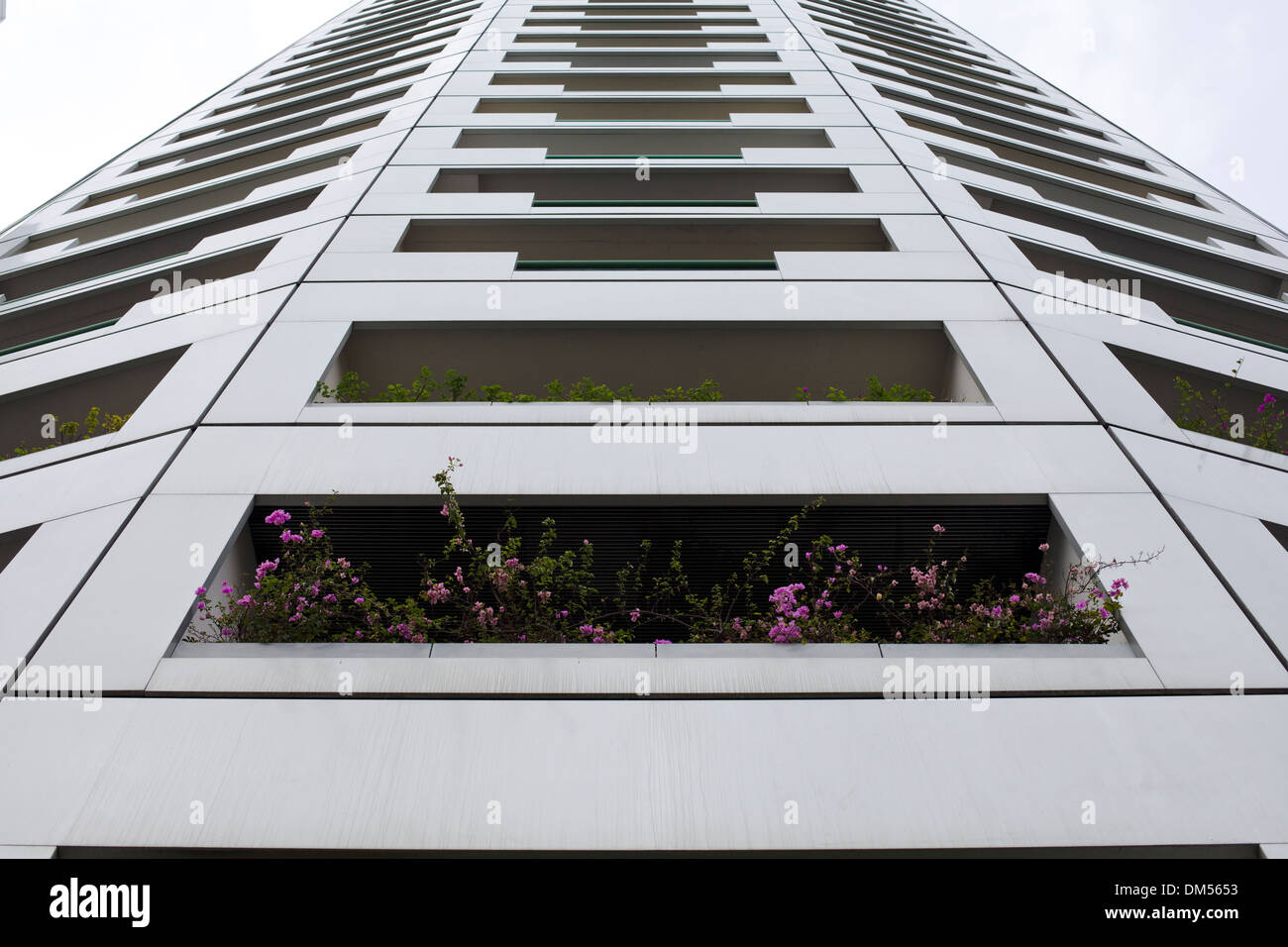 Looking up at a high-rise building in Singapore Stock Photo - Alamy