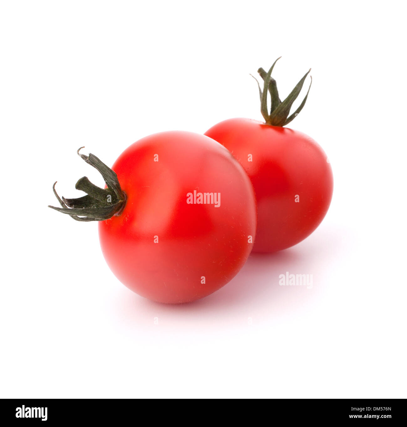 Small cherry tomato on white background close up Stock Photo - Alamy