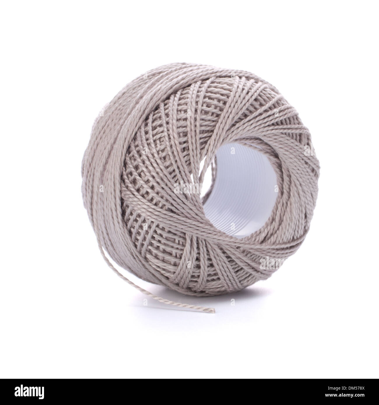 spool of grey thread isolated on white background Stock Photo - Alamy