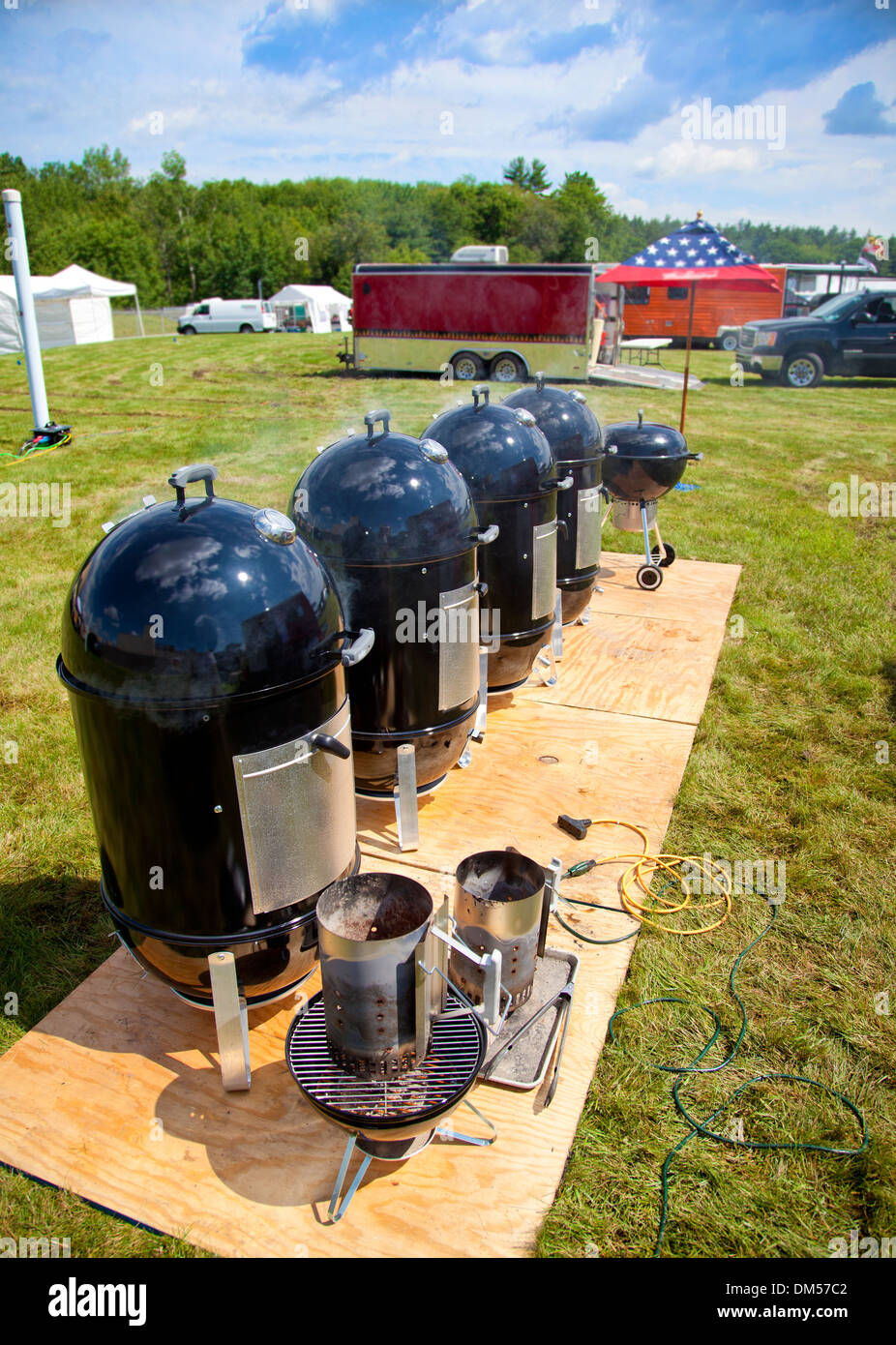 American BBQ smokers set up and smoking food Stock Photo - Alamy
