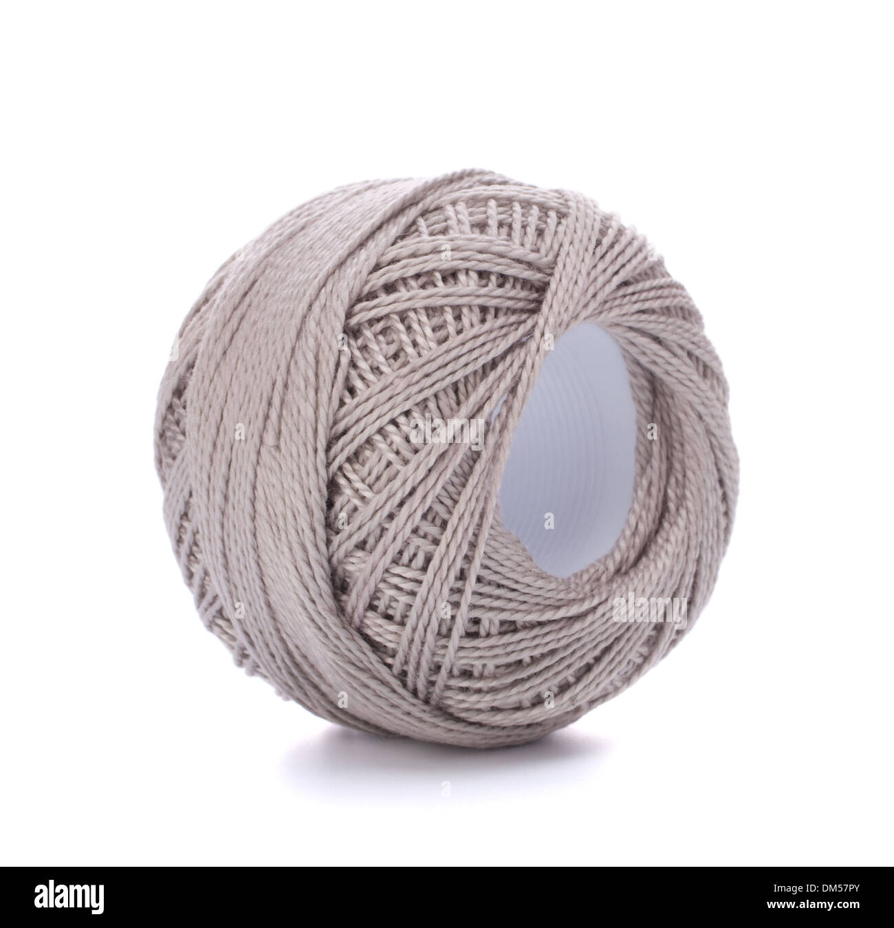 spool of grey thread isolated on white background Stock Photo - Alamy