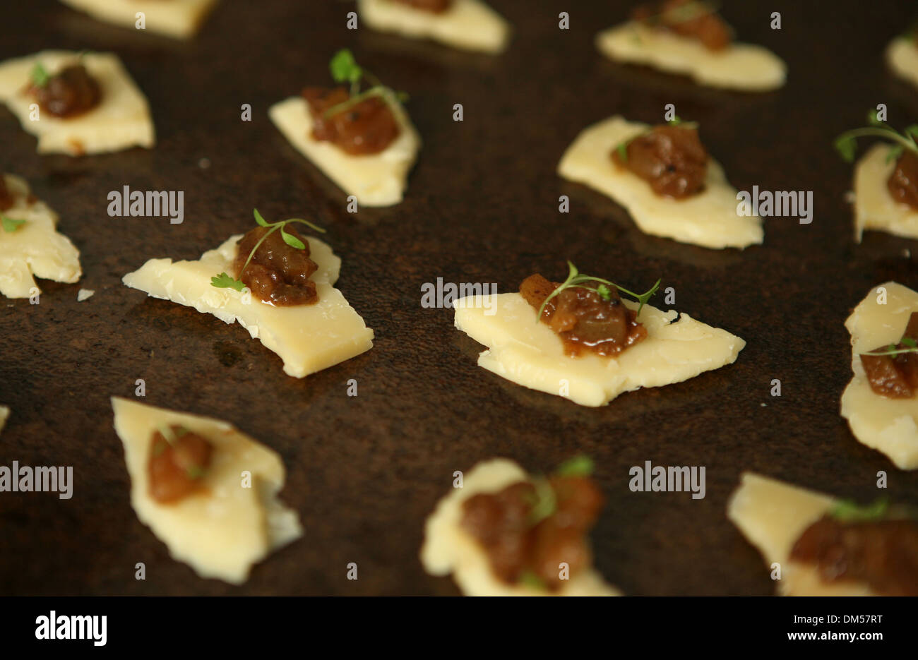 Small slabs of manchego cheese wit quince jam Stock Photo - Alamy