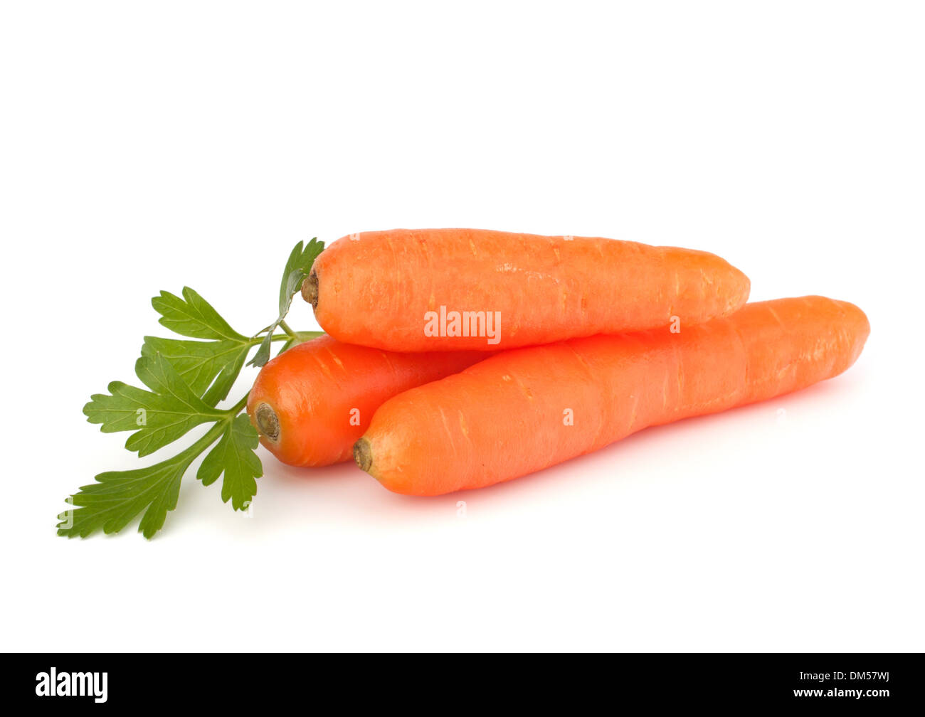Carrot tubers isolated on white background Stock Photo - Alamy