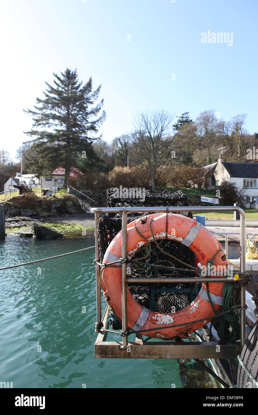 A rescue float on a fishing boat. Isle of Islay, Scotland Stock Photo ...