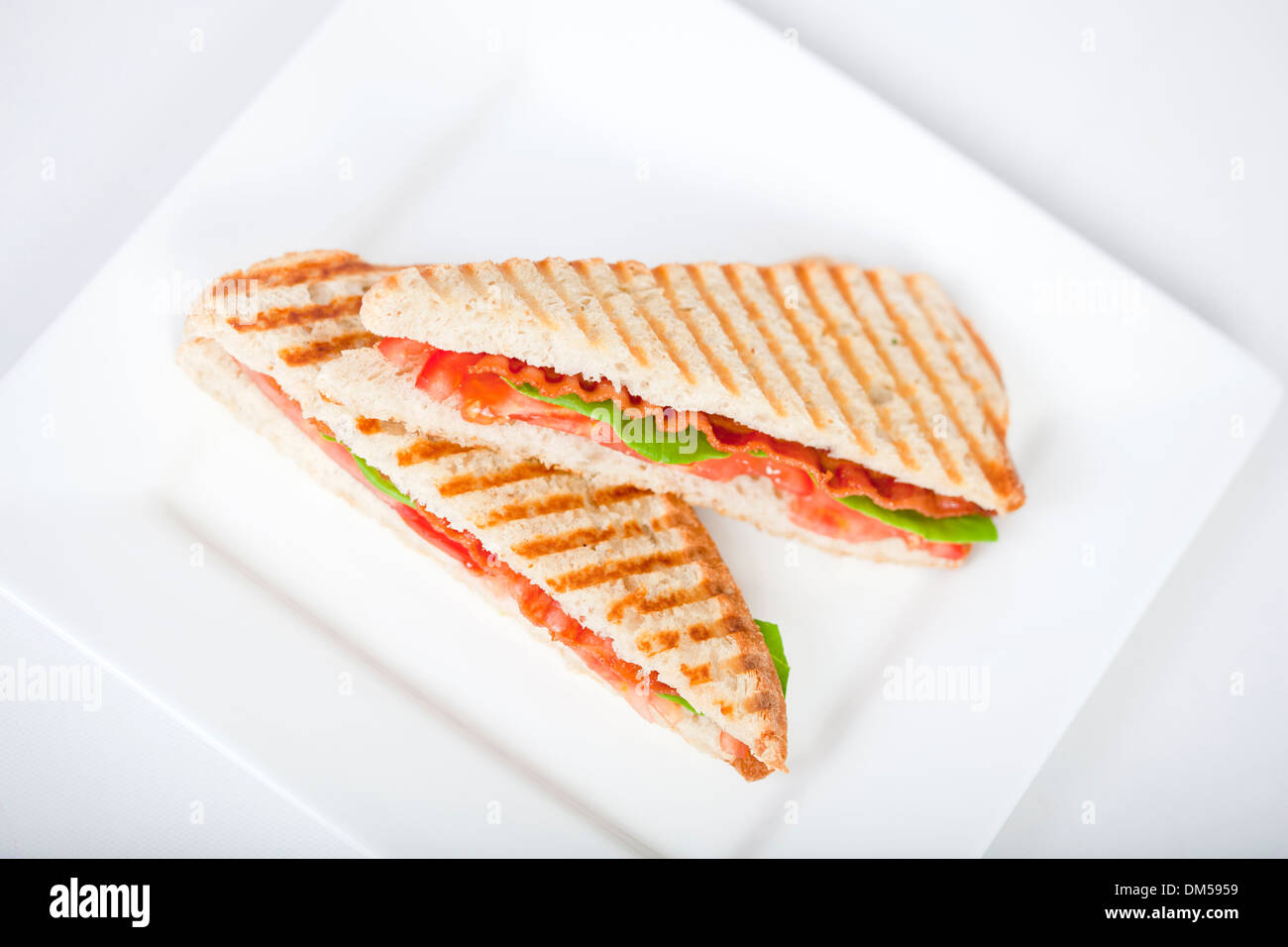Fresh toasted panini blt sandwich with grill marks Stock Photo - Alamy