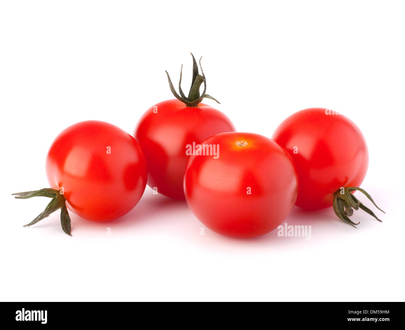Small cherry tomato on white background close up Stock Photo - Alamy